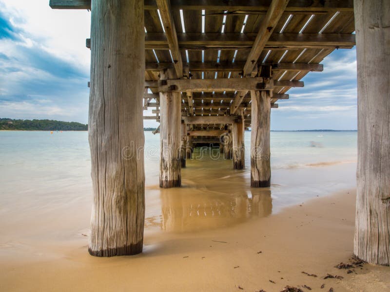 Under the Boardwalk stock photo. Image of ocean, shore - 65965748
