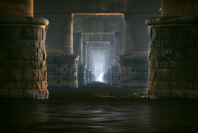 Under the bridge stock image. Image of arches, columns - 73593625