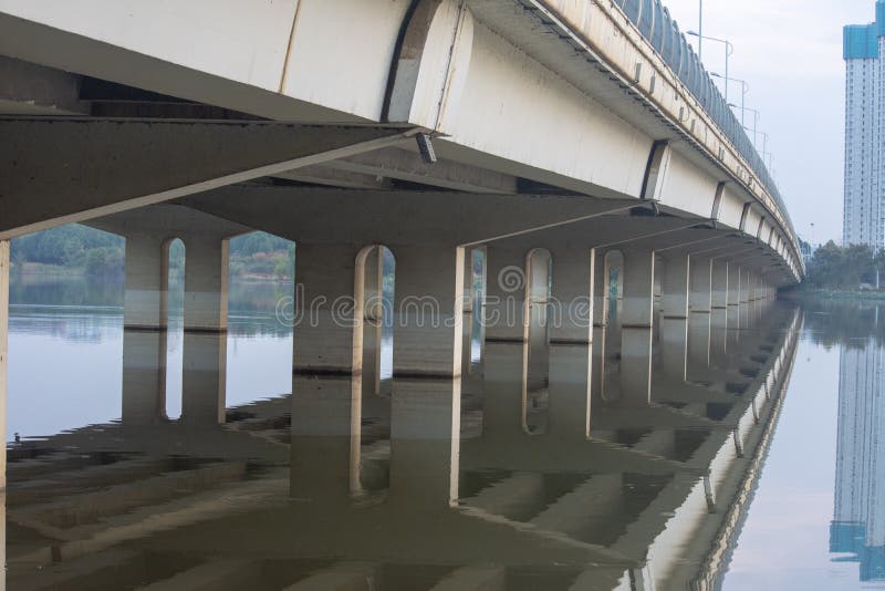 Under the Bridge with Reflection Stock Photo - Image of dark, underside ...