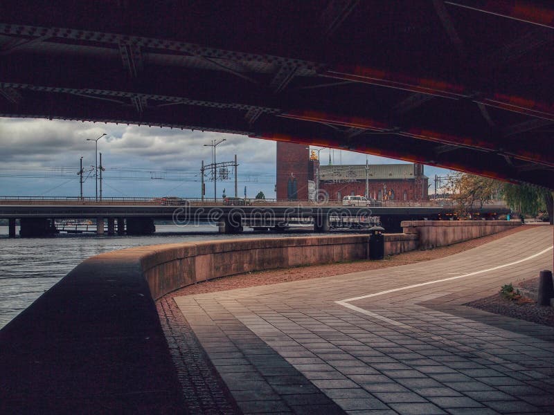 Under a bridge in city stock image. Image of light, night - 255687447