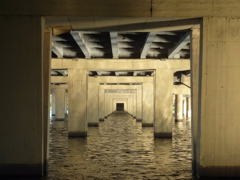 Under the Bridge that is Illuminated by the Bright Sun Stock Photo ...