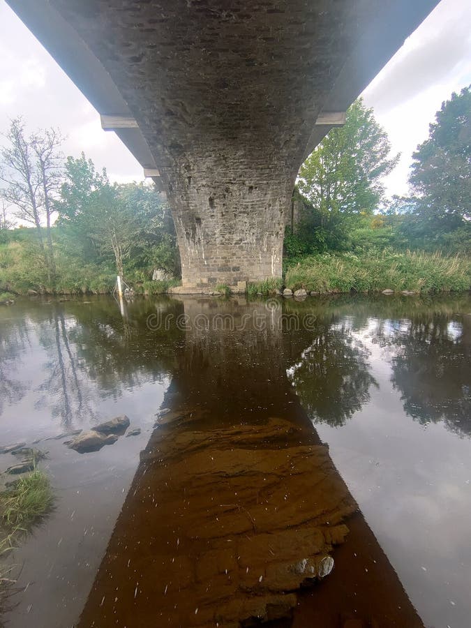 Under bridge reflection stock photo. Image of reflection - 288248546