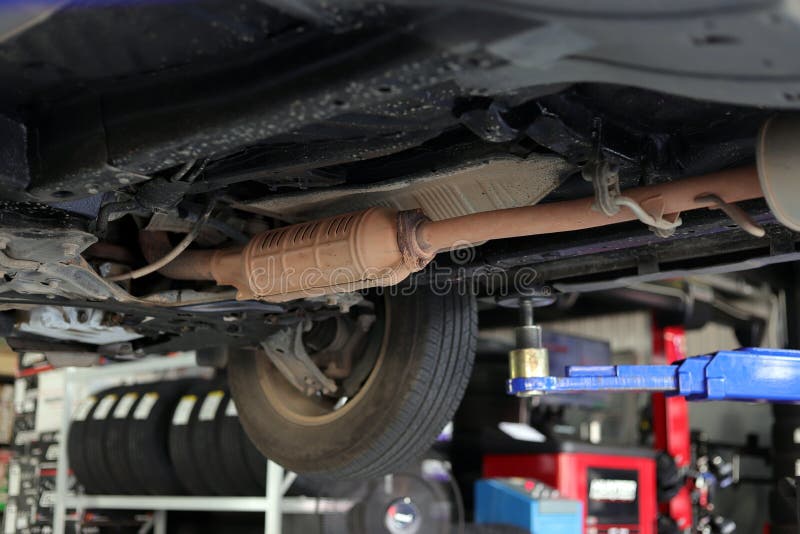Under the Car in Car Garage Stock Photo - Image of finance, lying ...