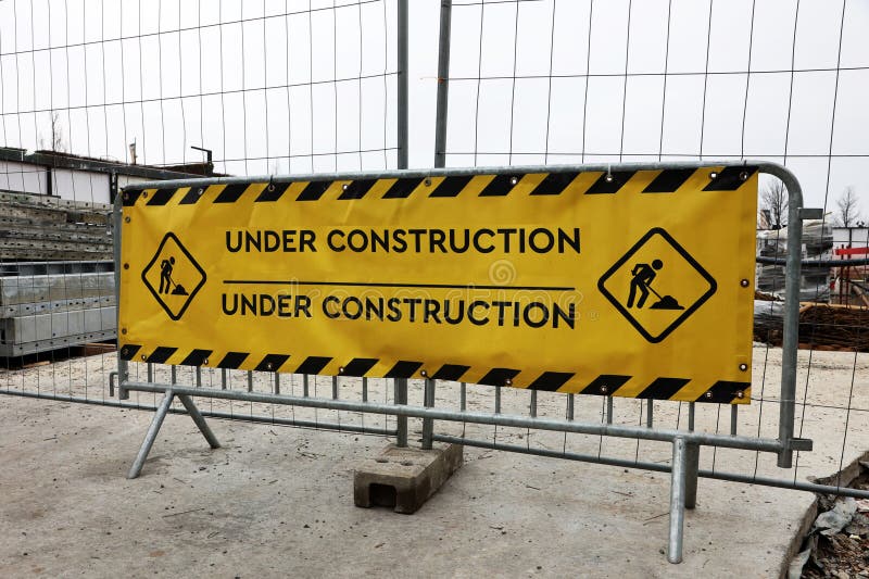Under construction banner stock photo. Image of maintenance - 361999640