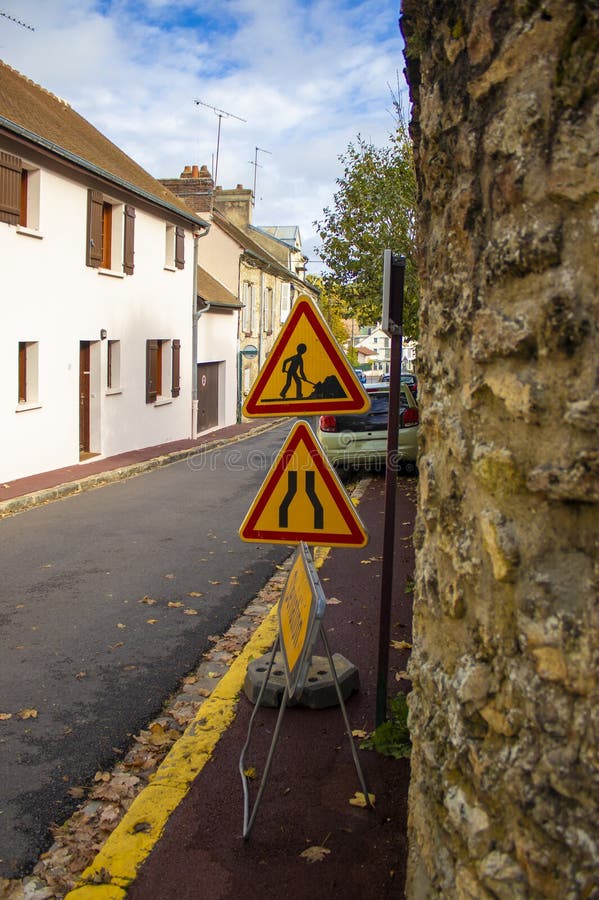 Under Construction Board Sign on the Closed Road with Arrow Sign and ...