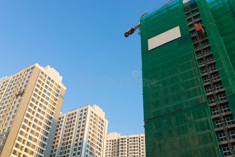 Under Construction Building with Finished Built Buildings Stock Photo ...