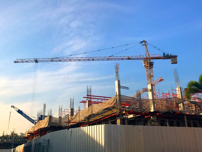 Under Construction Building Covered with Net and Galvanized she ...