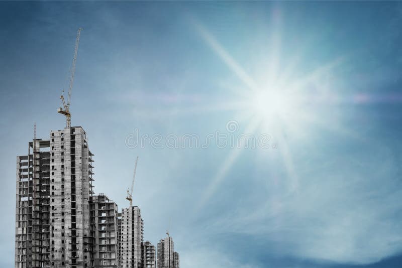 Under Construction Buildings with Tower Crane on Blue Sky with Bright ...