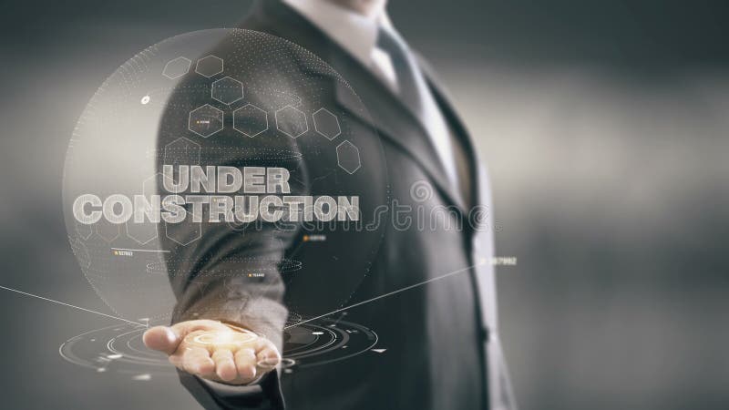 Under Construction Businessman Holding in Hand New Technologies Stock ...