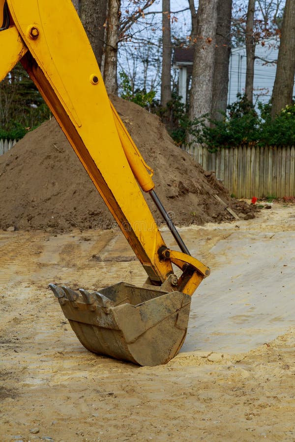 Excavator Bucket Backfilling Trench for Stone Backfill of Foundation ...