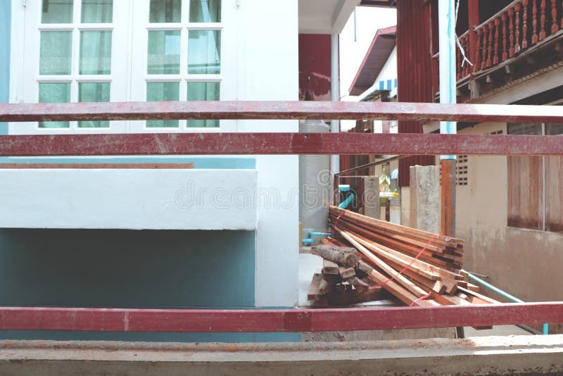Under Construction House with Wood Fence Stock Photo - Image of alps ...