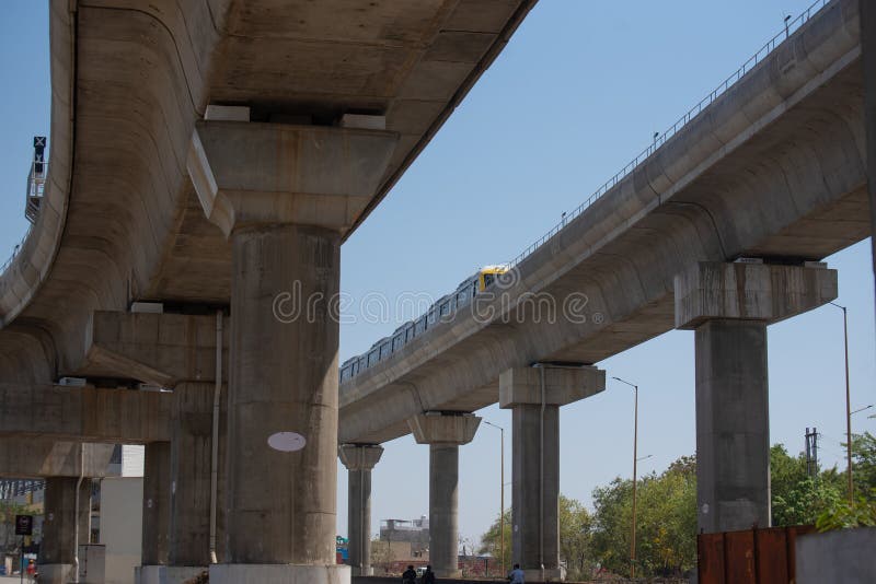 Under Construction Metro Rail Track and Metro Train Running on it for ...