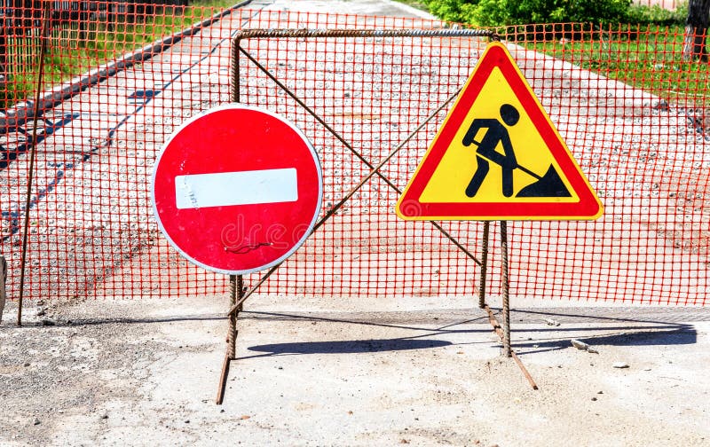 Under Construction Road Sign on the Closed Road Stock Photo - Image of ...