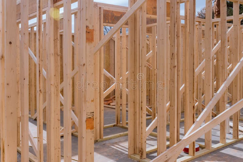 Under Construction Timber Frame House with a Wooden Beam Framework on ...