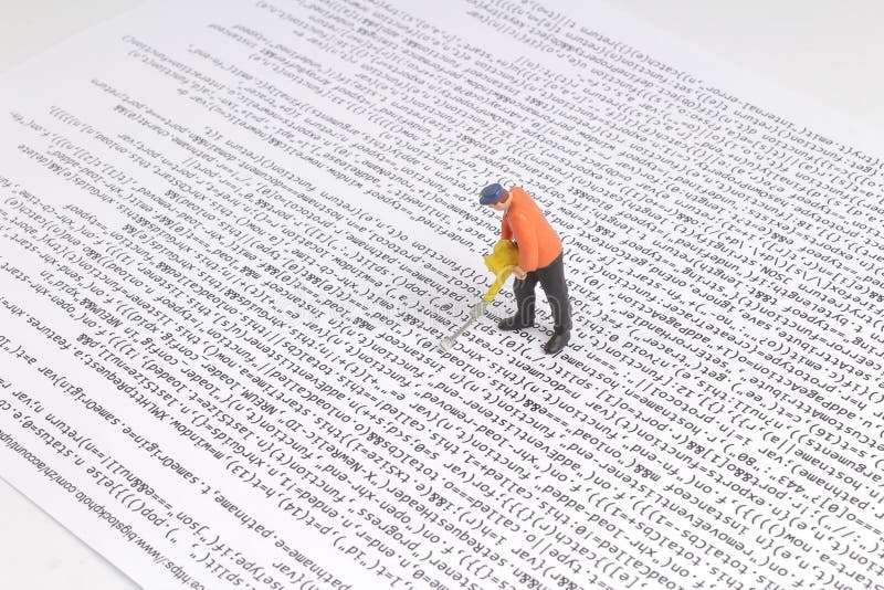 Under Construction Worker Figurines Working on Code. Stock Image ...