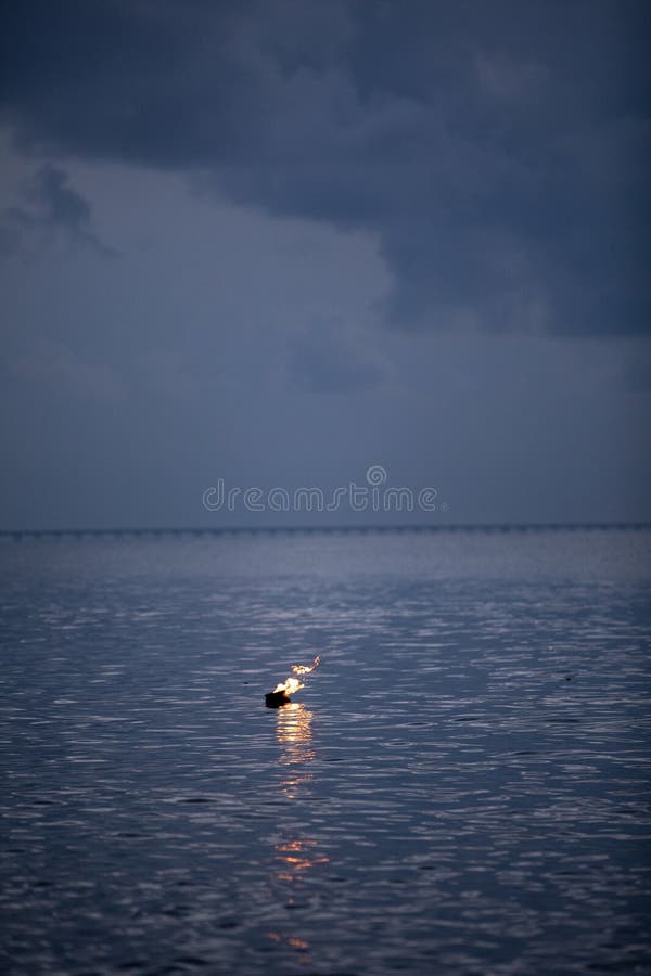 Sky Burning Fire Floating on the Water Stock Photo - Image of beautiful ...