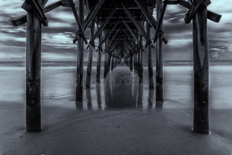 Under the Dock at the Beach in Black and White Stock Image - Image of ...