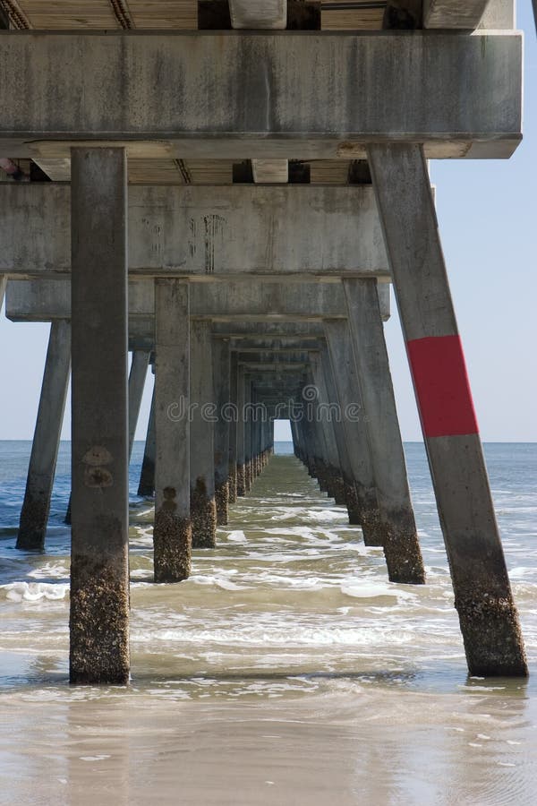 Waves Under a Pier stock image. Image of powerful, spring - 11921481