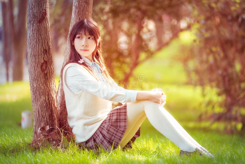 A maiden in the sun stock photo. Image of chinese, season - 123994034