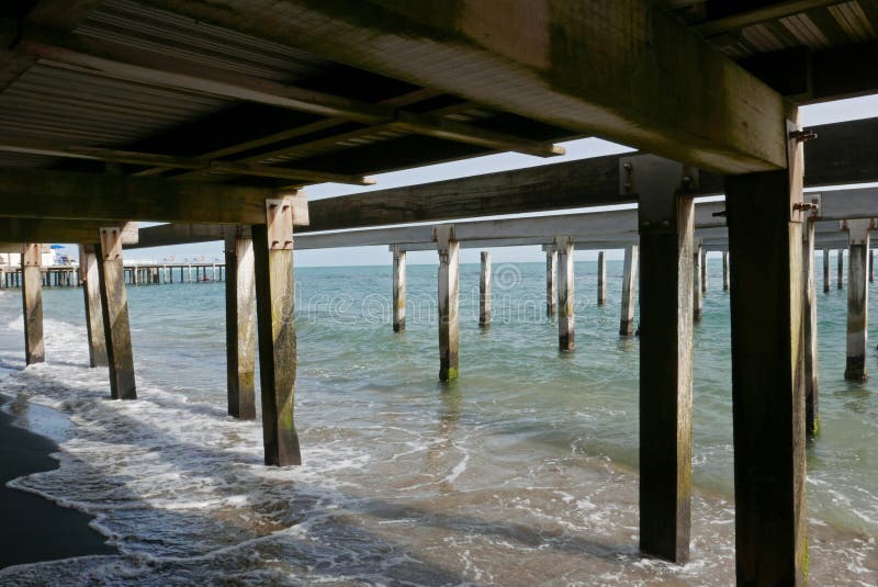 Under a jetty stock photo. Image of pillars, poles, italian - 119690352