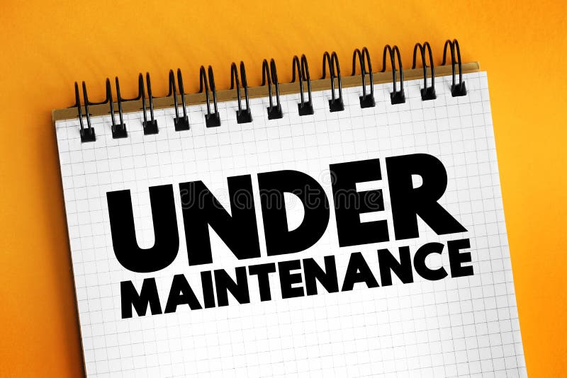 Under Maintenance Text on Notepad, Concept Background Stock Photo ... Under Maintenance Text on Notepad, Concept Background Stock Photo ...