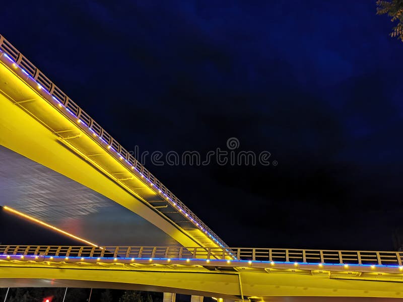 Under the Night, the Two Bridges Intersect Each Other and Form a ...