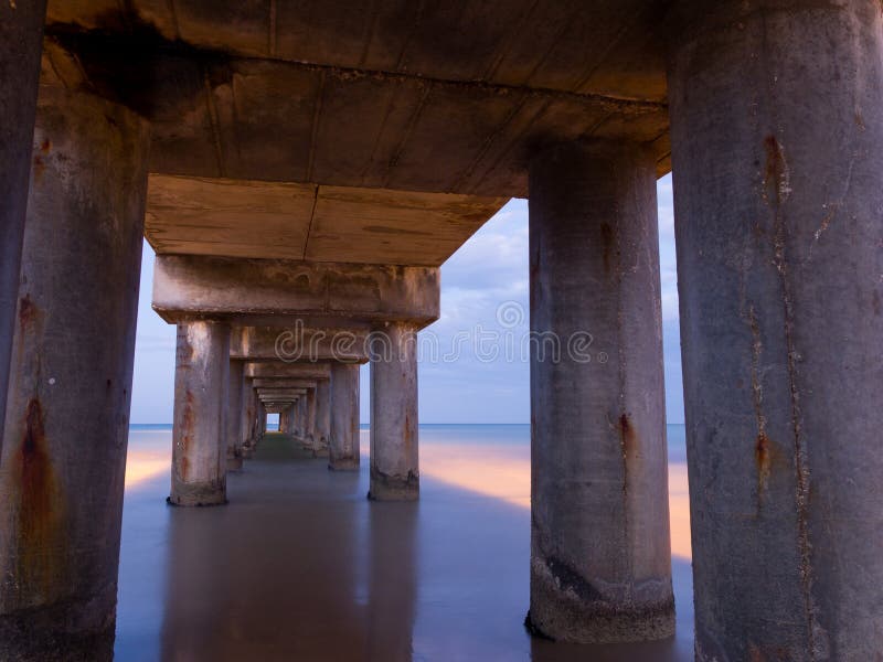 Under the pier stock image. Image of water, ocean, still - 16653941