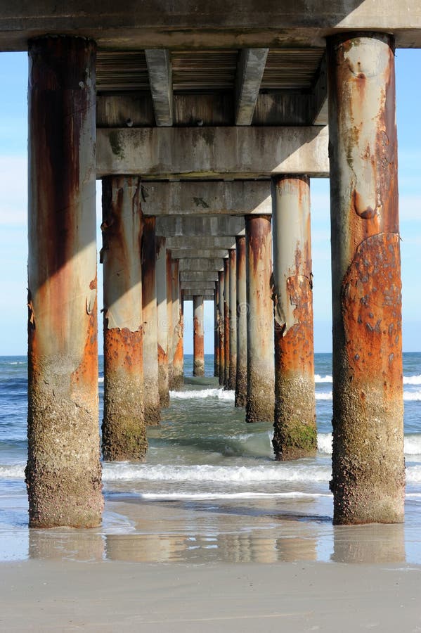 Under the Pier stock photo. Image of pier, poles, rusty - 8410708