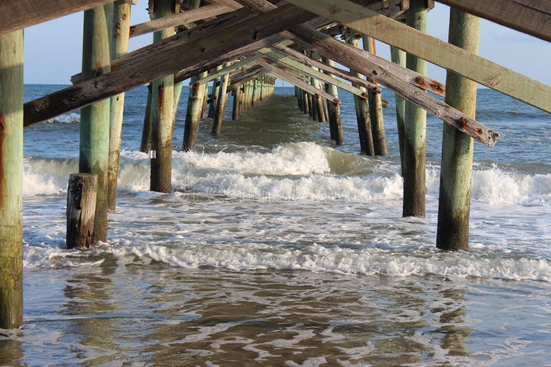 Under pier stock photo. Image of ocean, waves, dock, pier - 66430104