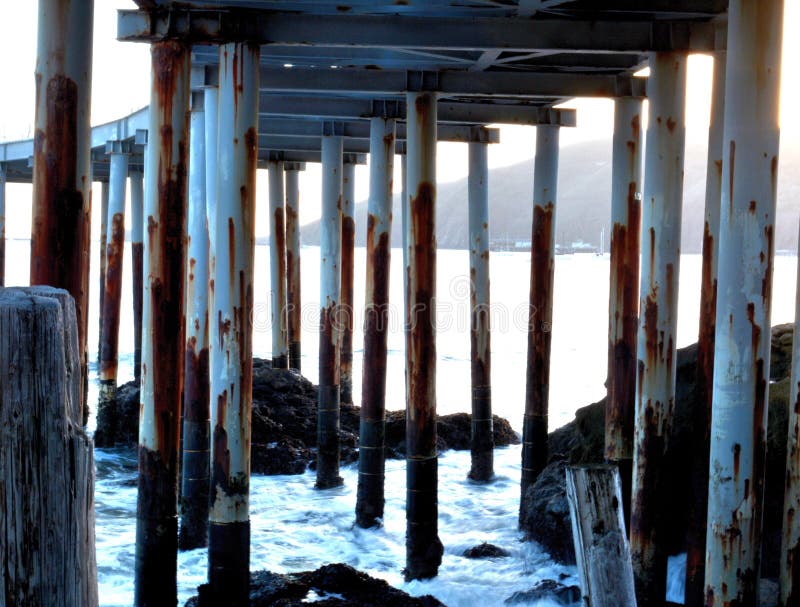 Under the Pier stock photo. Image of rusty, ocean, pier - 69495716
