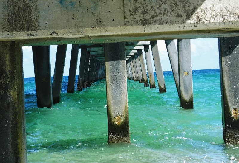 Under the Pier stock image. Image of ocean, blue, green - 95175341