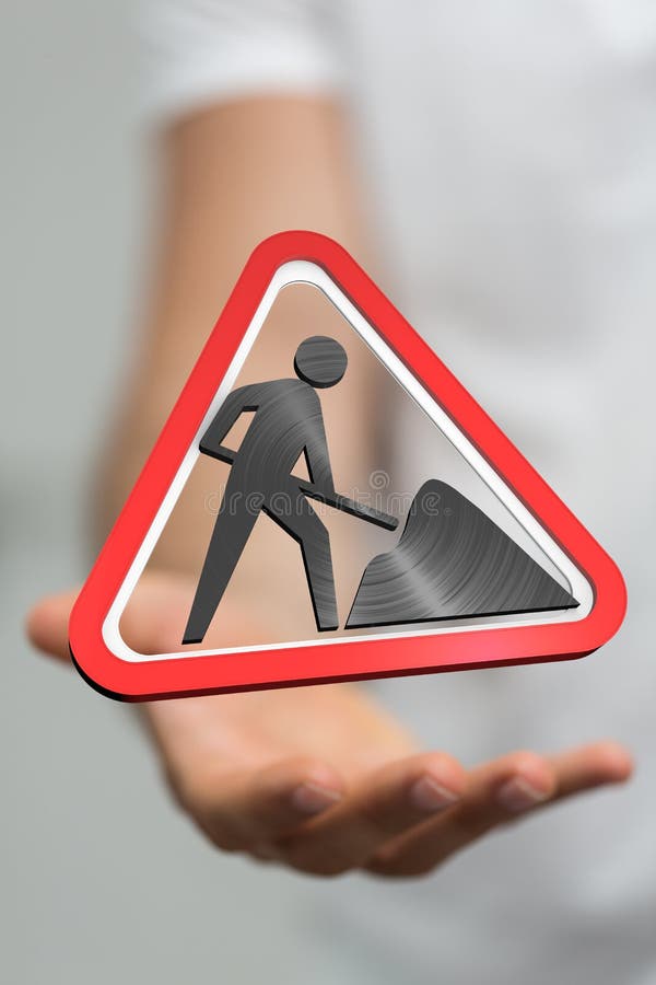 A Under Process Sign in Hand Stock Photo - Image of safety, road: 176209278