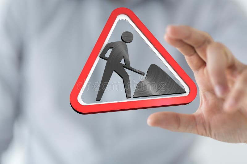 A Under Process Sign in Hand Stock Photo - Image of construction ...