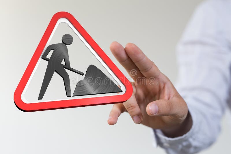 A Under Process Sign in Hand Stock Image - Image of road, business ...