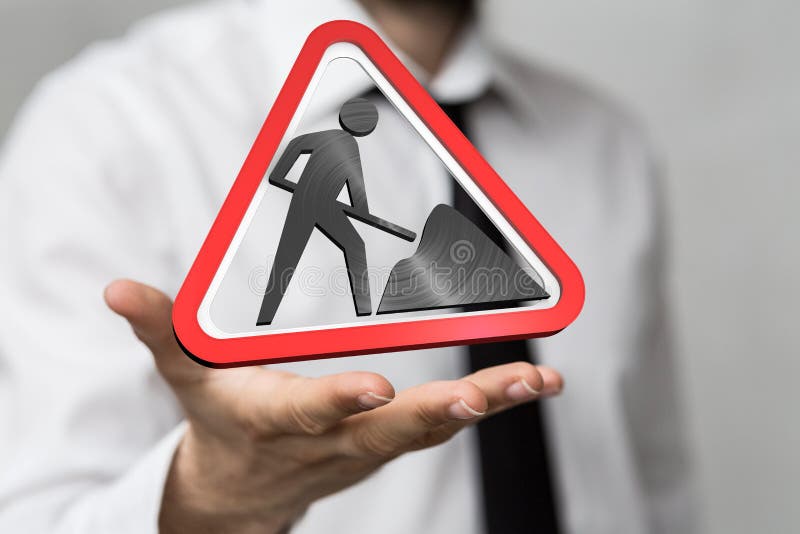 A Under Process Sign in Hand Stock Photo - Image of build, building ...