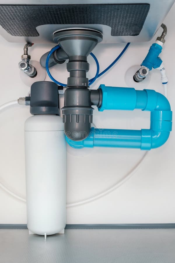 Under Sink Plumbing and Drainage with Siphon System in Modern Bathroom ...