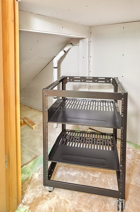 Under Stair Network Closet Drywalled Stock Image - Image of closet ...