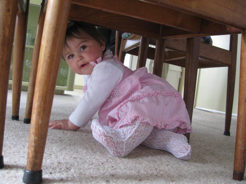 Under the table editorial stock image. Image of baby - 43001194