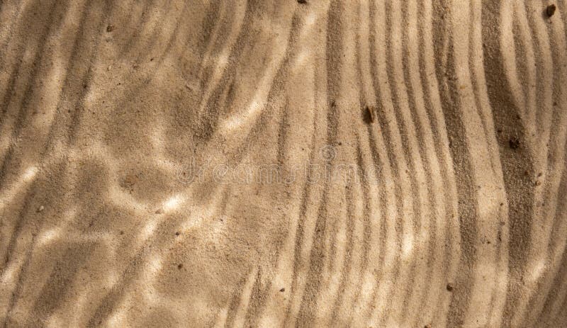 Under Water Texture Light Shadows on the Beach Sand. Stock Photo ...