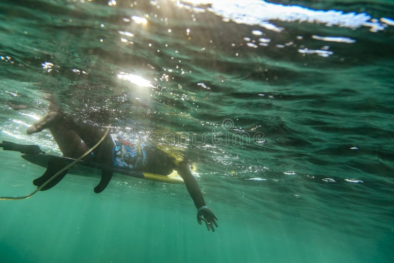 Under water view of surfer stock image. Image of male - 176211231
