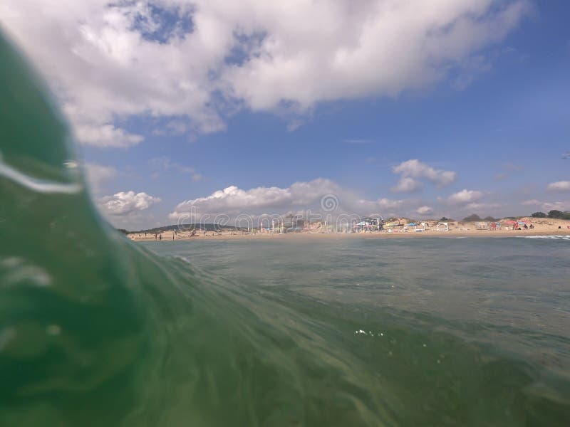 Under a Wave View with Blue Sky and Clouds Stock Image - Image of ...