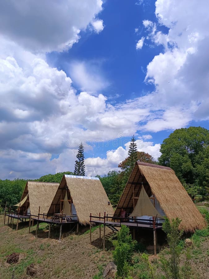 Under the White Clouds Will See the Hut Stock Image - Image of hill ...