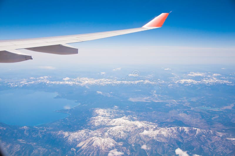 Under the wing stock photo. Image of clouds, desert, river - 25247814