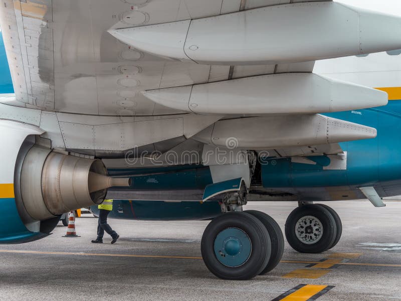 Under wing aircraft stock image. Image of gear, runway - 67983237