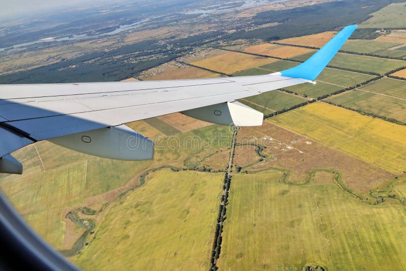 Under the Wing of the Plane. Panoramic Views of the Sky and the Earth ...