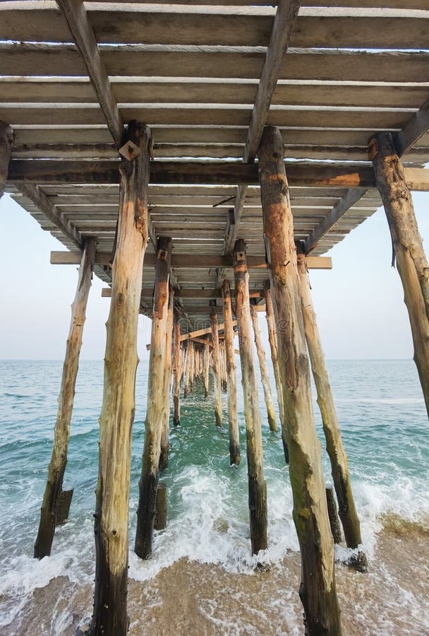 Under the wooden bridge stock image. Image of beach - 209549799
