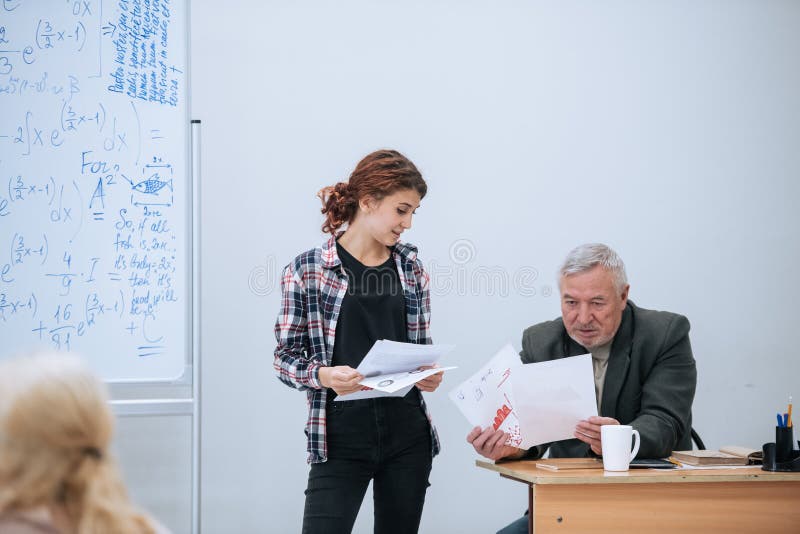 An Underachieving Student Tries To Solve an Equation at the Blackboard ...