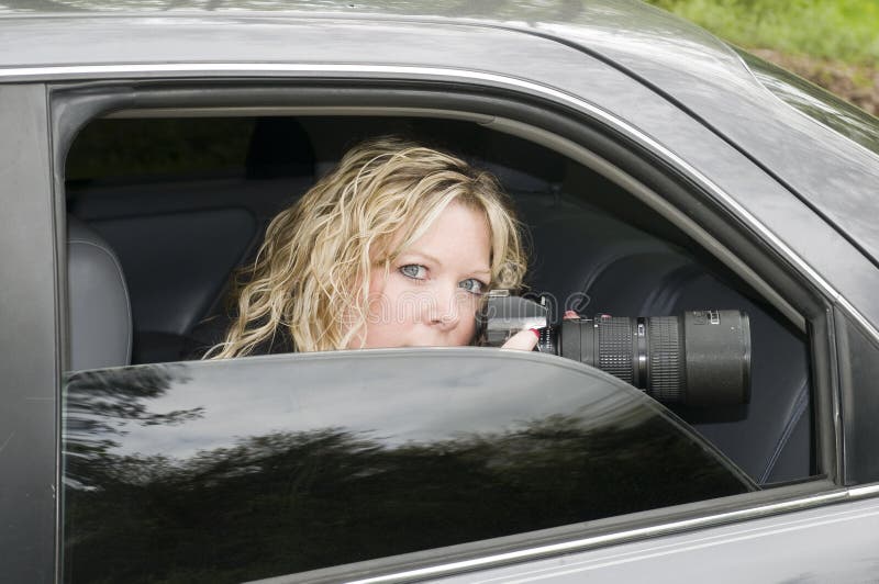 Undercover Woman Spying Camera Stock Photo - Image of long, windows ...