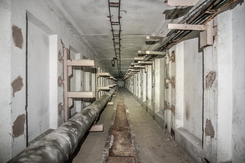 Underground Concrete Utility Tunnel with Pipes and Wires Stock Photo ...