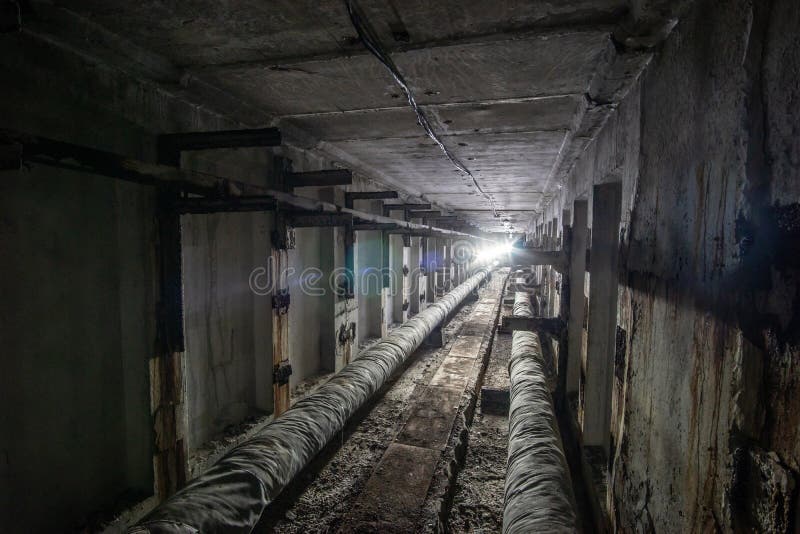 Underground Concrete Utility Tunnel with Pipes and Wires. Utility ...